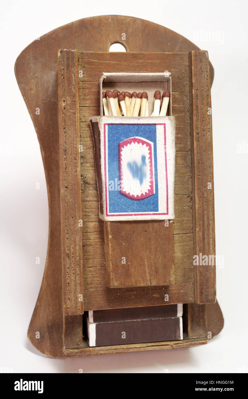 The old-fashioned way of storing the matches in an antique fixture ...