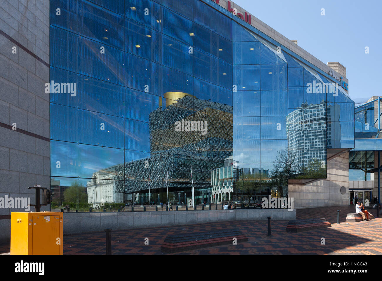 The new Library of Birmingham refllected in the windows of the Symphony ...