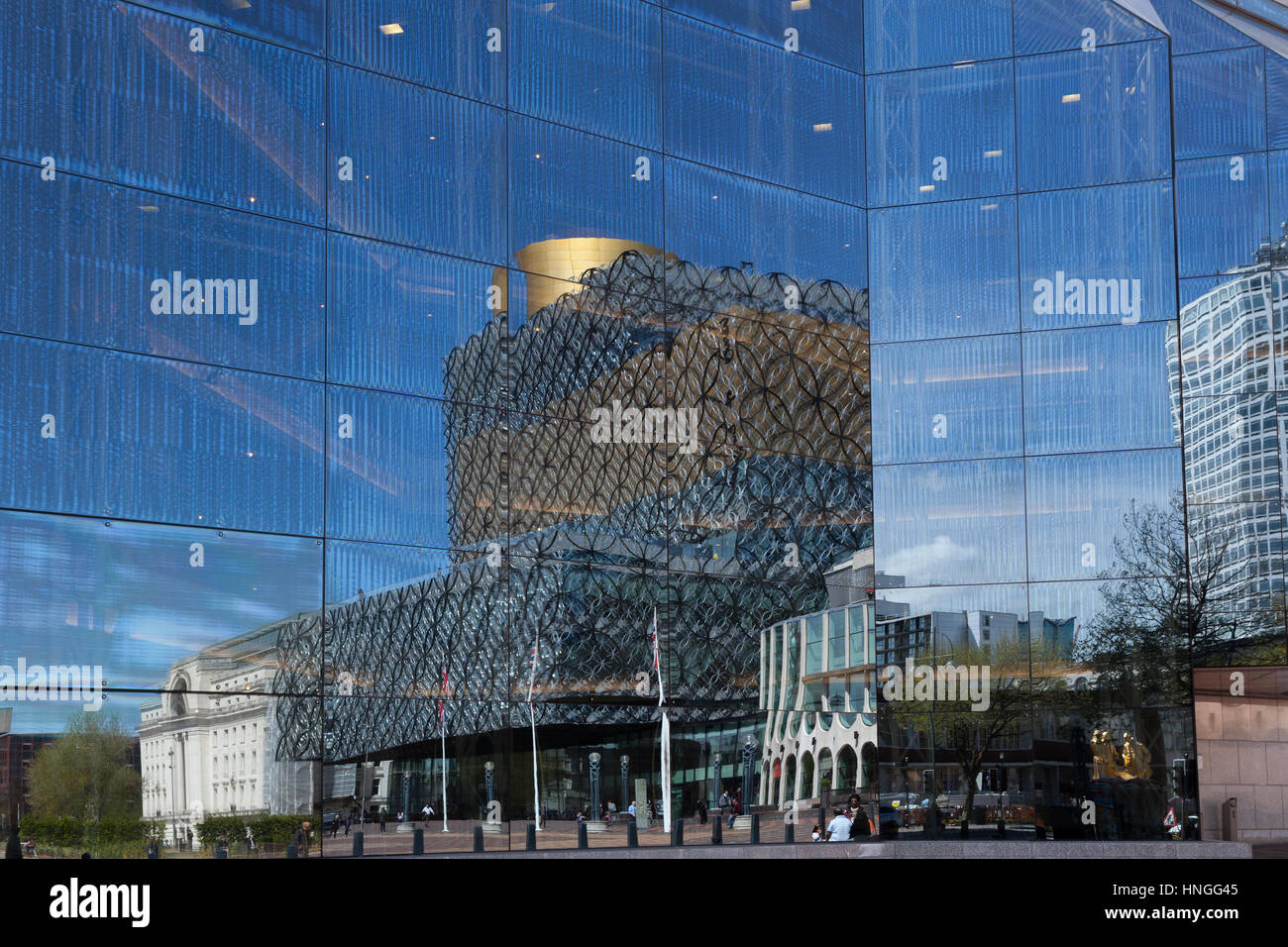The new Library of Birmingham refllected in the windows of the Symphony ...