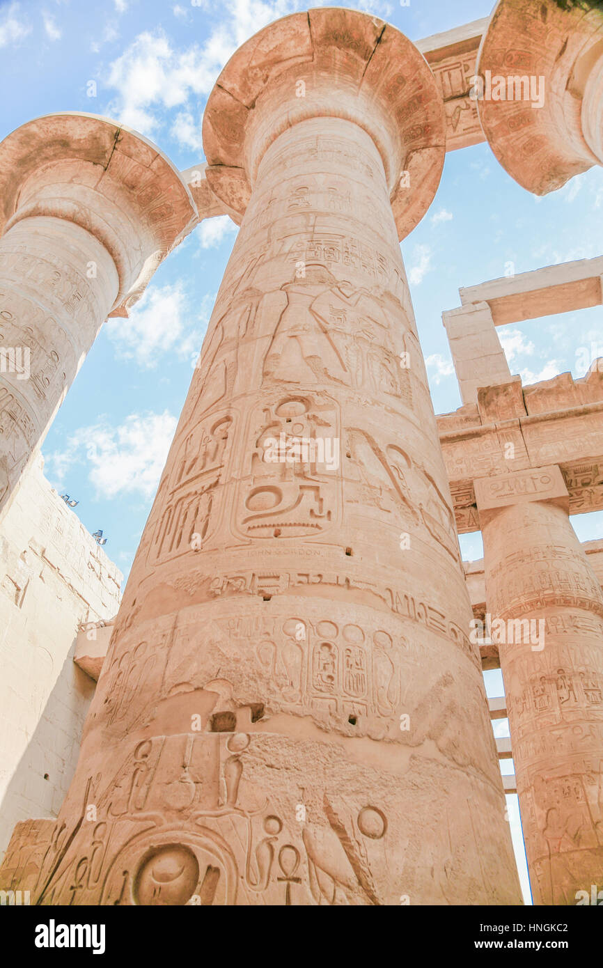 big stone columns with carving figures and hieroglyphs in landmark ...