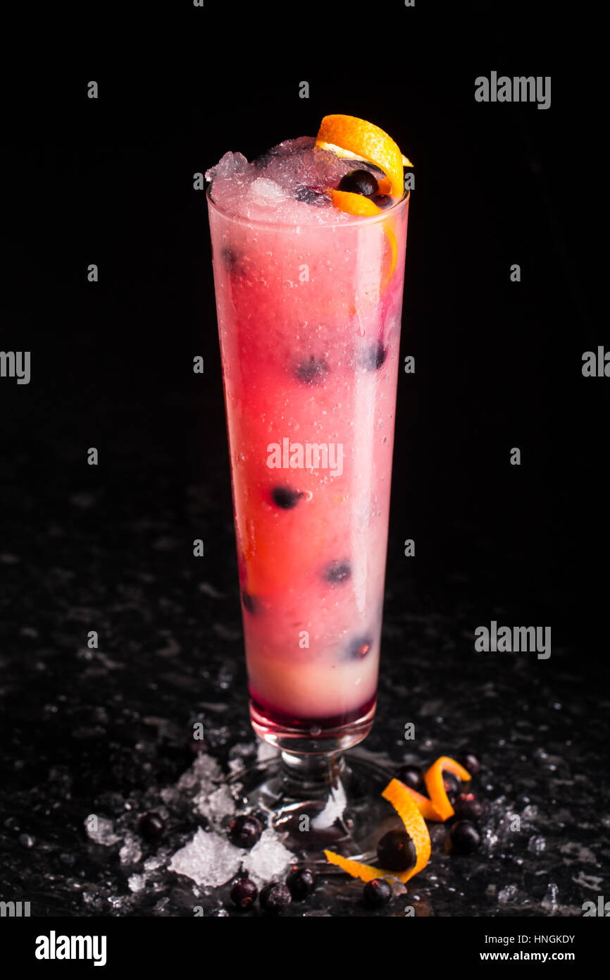 Currant cocktail in a long glass Stock Photo - Alamy