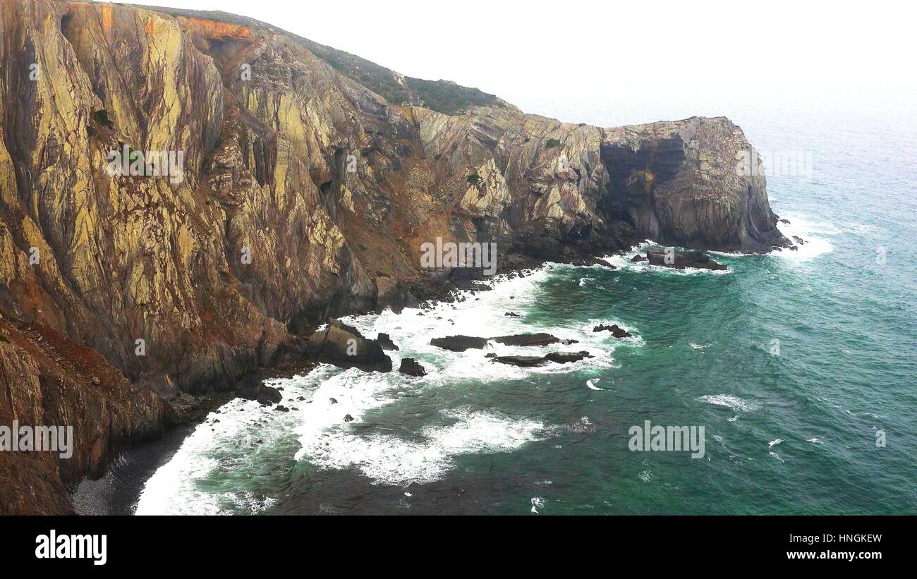 Ocean Waves Hit Cliffs During Fog Stock Photo - Alamy