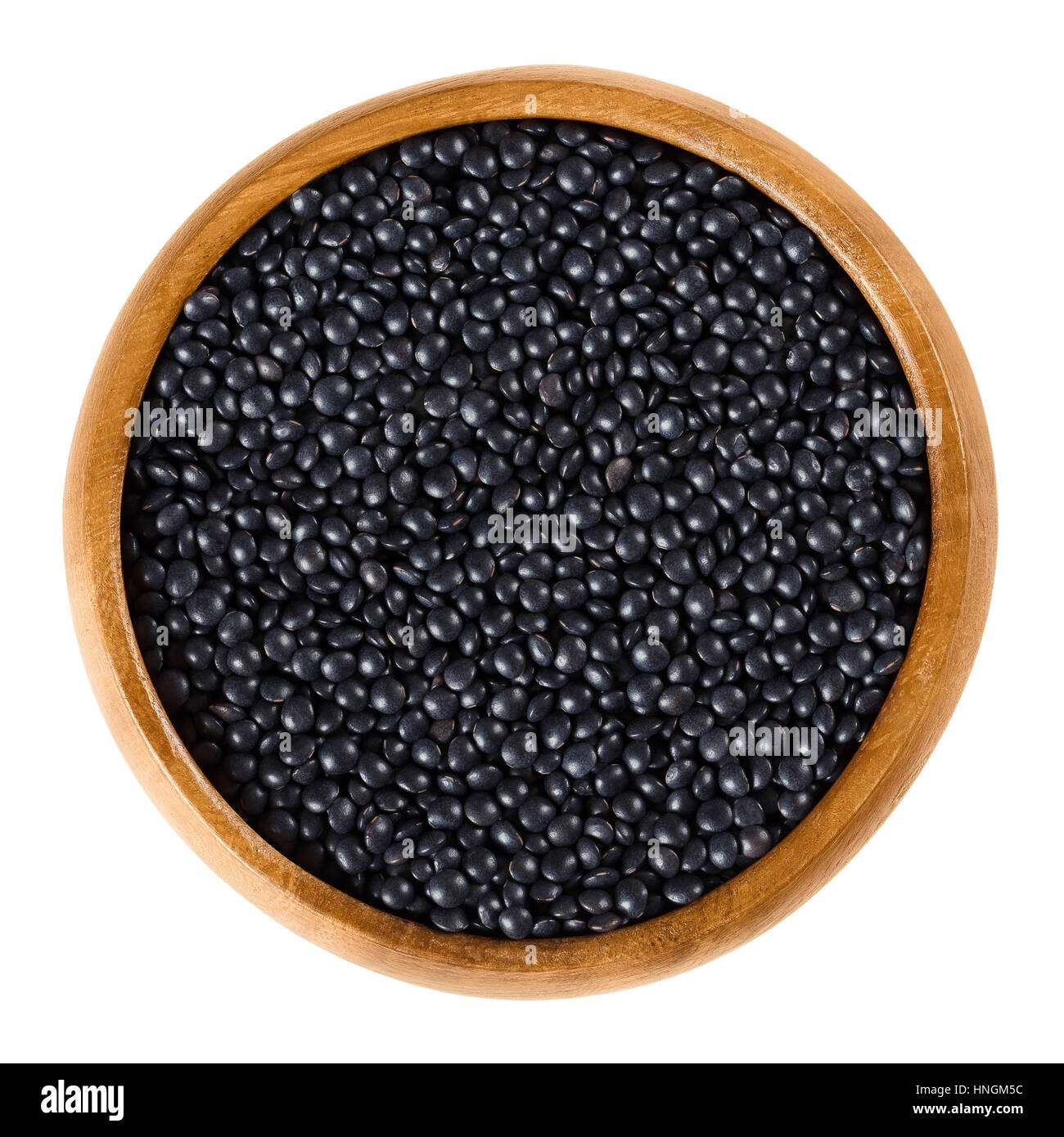 Beluga lentils in wooden bowl. Black lentils, edible pulse with bead ...