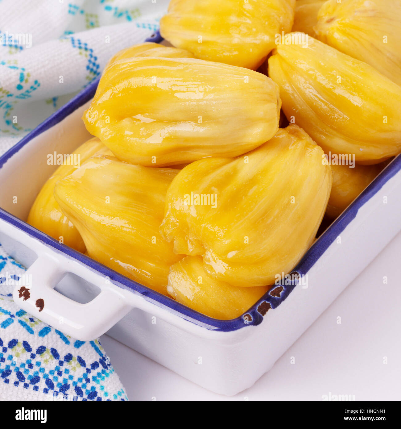 Tropical fruit Jackfruit (jakfruit, jack, jak) with blue towel in bowl ...
