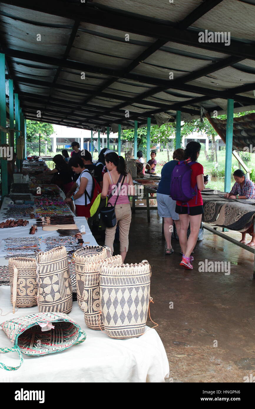 Tourists visit Sarawak native traditional handicrafts market at Penan ...