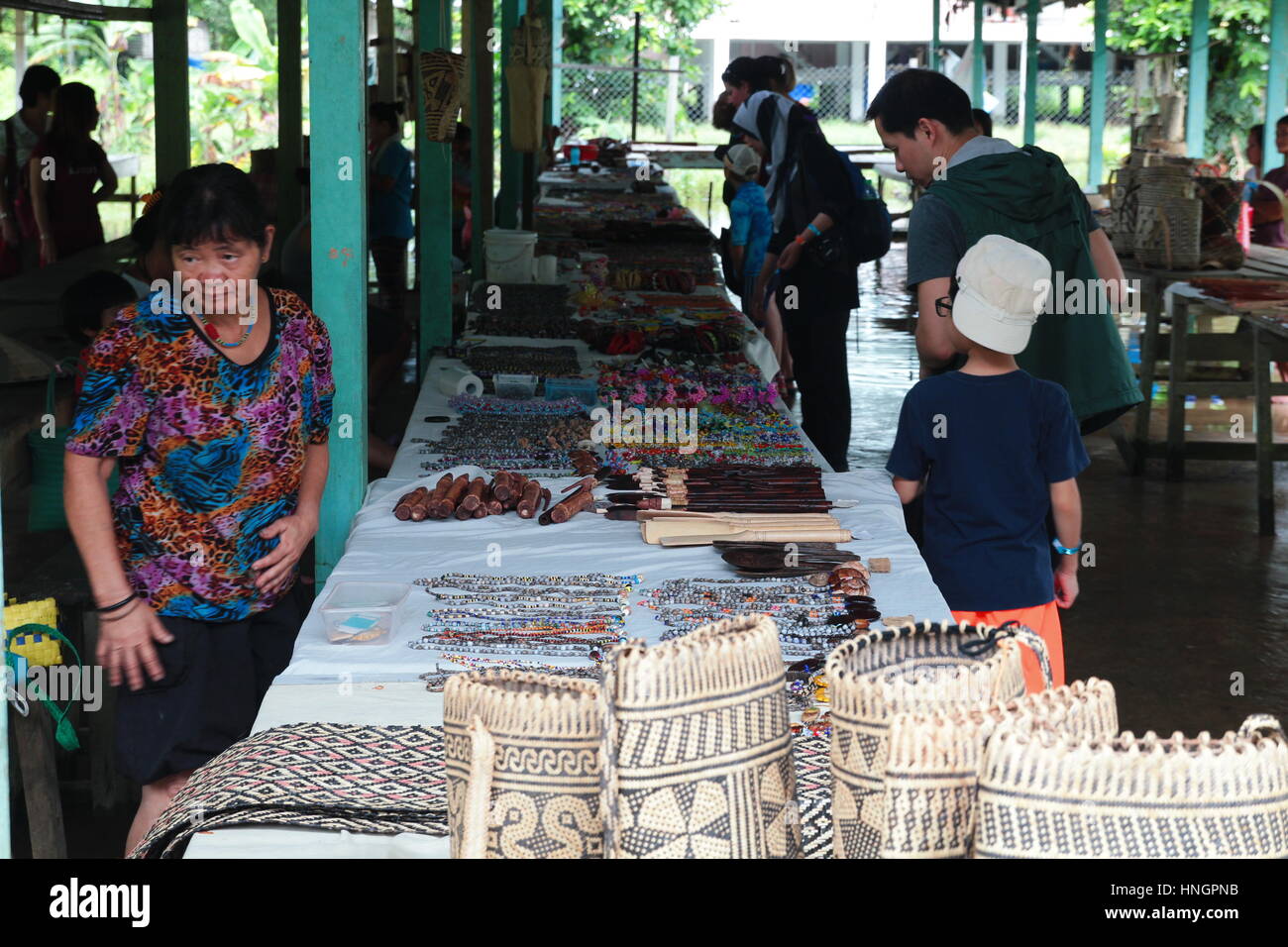 Tourists visit Sarawak native traditional handicrafts market at Penan ...