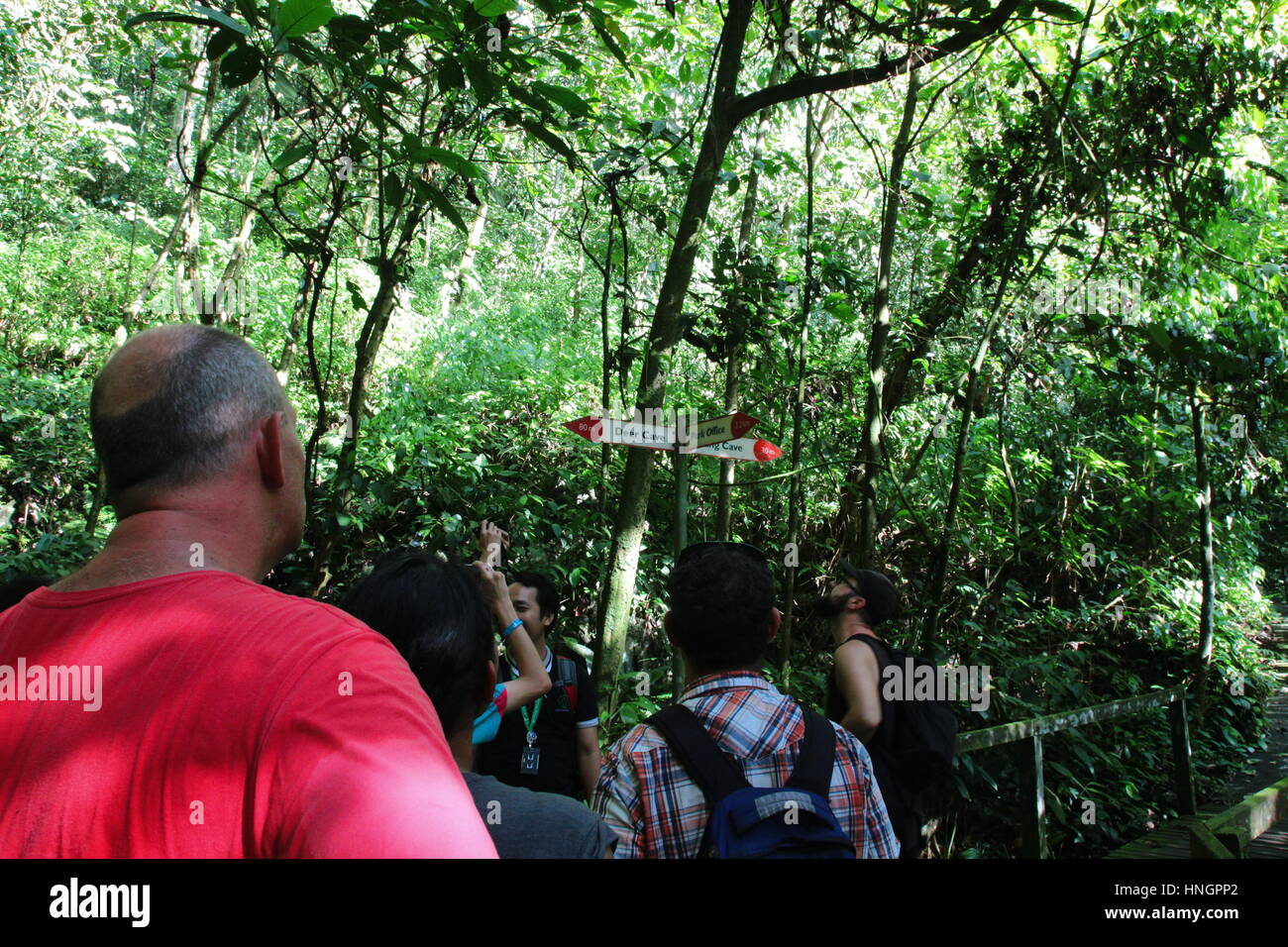 Visitors pay attention on the park tour guide briefing at the entrance ...