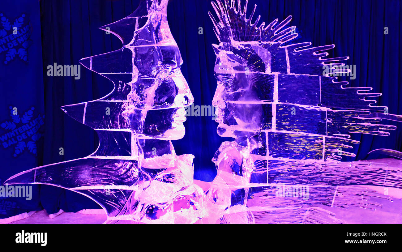 Human faces ice sculptures illuminated at night in Confederation Park ...