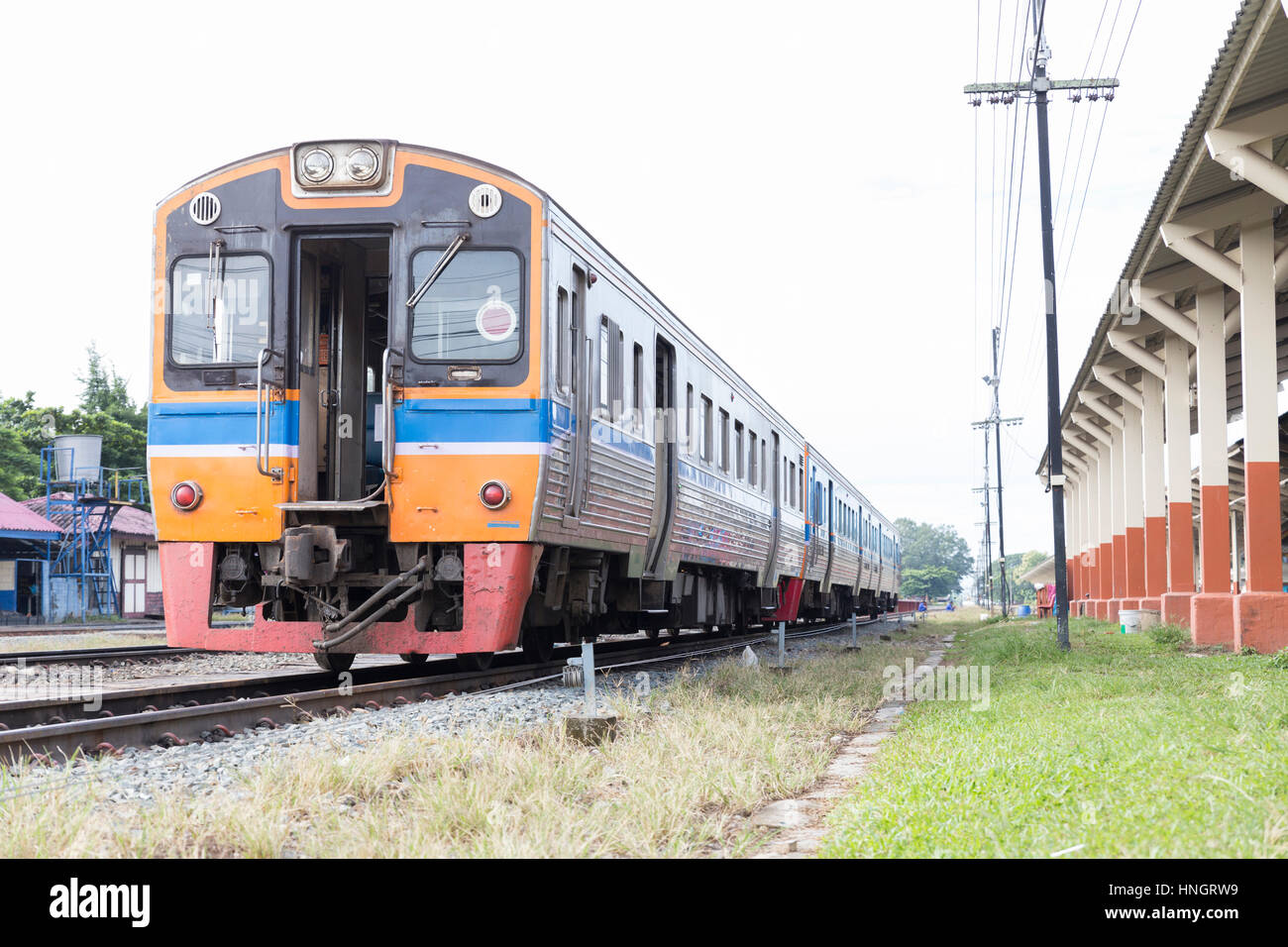 train parking on railway track at train station Stock Photo - Alamy