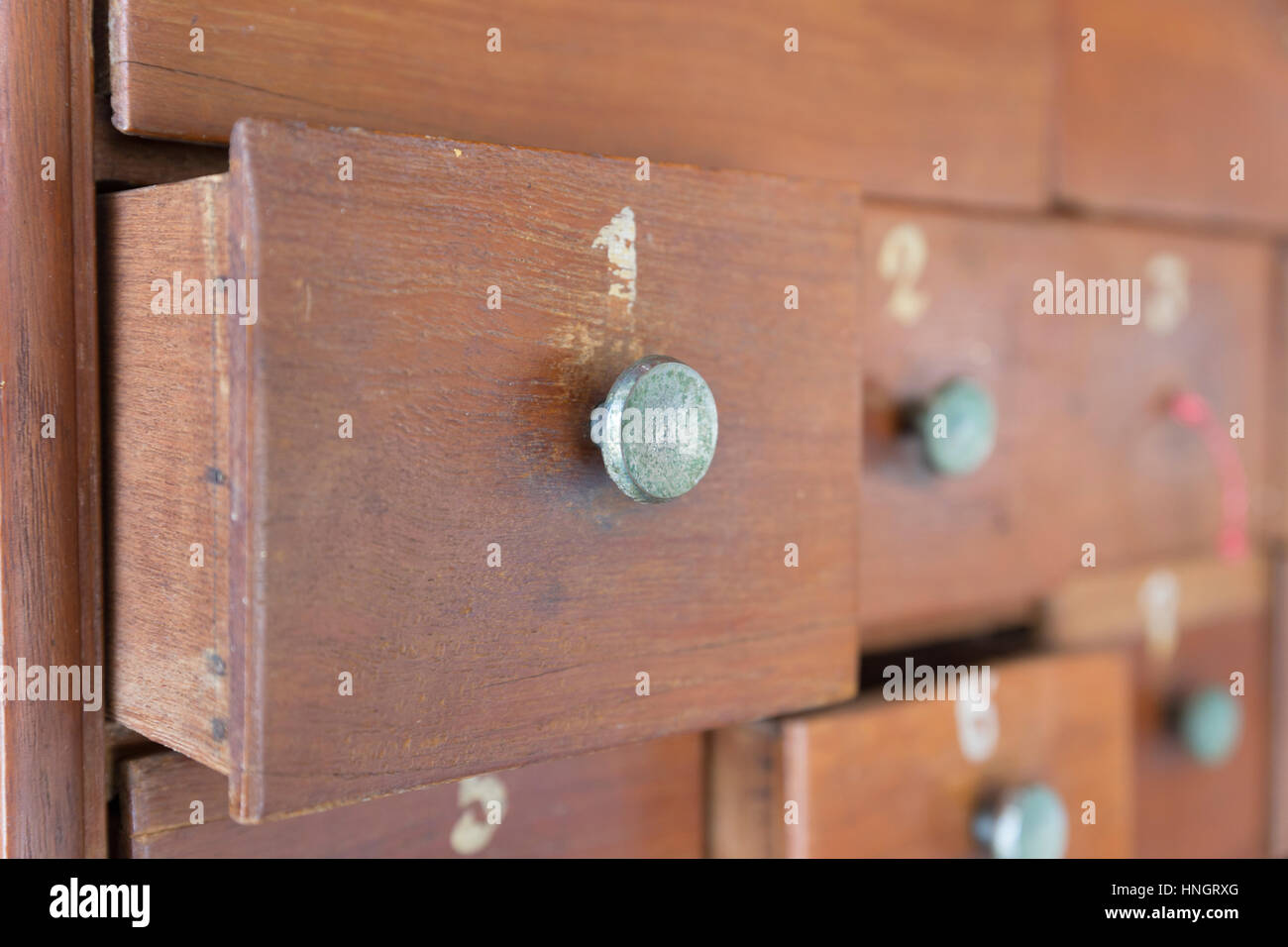 wooden drawer of old cabinet with number Stock Photo - Alamy