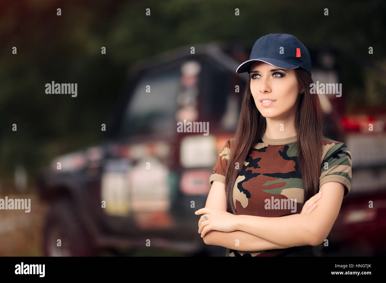 Female Driver in Army Outfit Next to an Off Road Car Stock Photo - Alamy