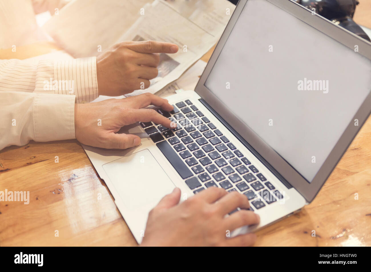 man's hand working with laptop computer notebook for working concept ...
