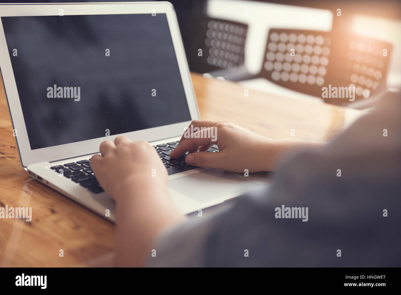 woman's hand typing with laptop computer notebook for working concept ...