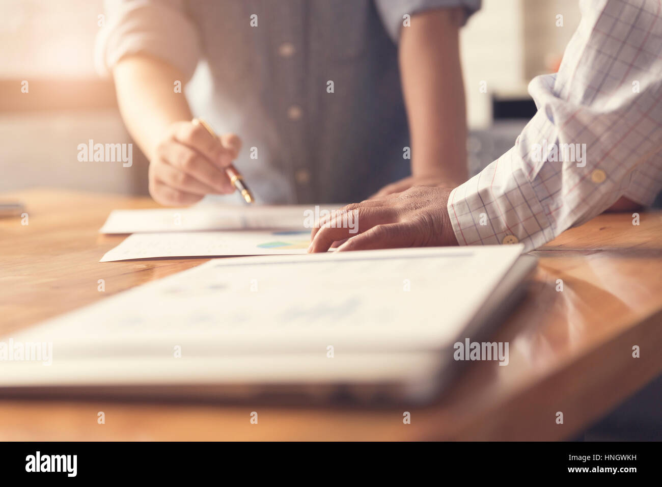 woman's hand holding pen working with business document for working ...