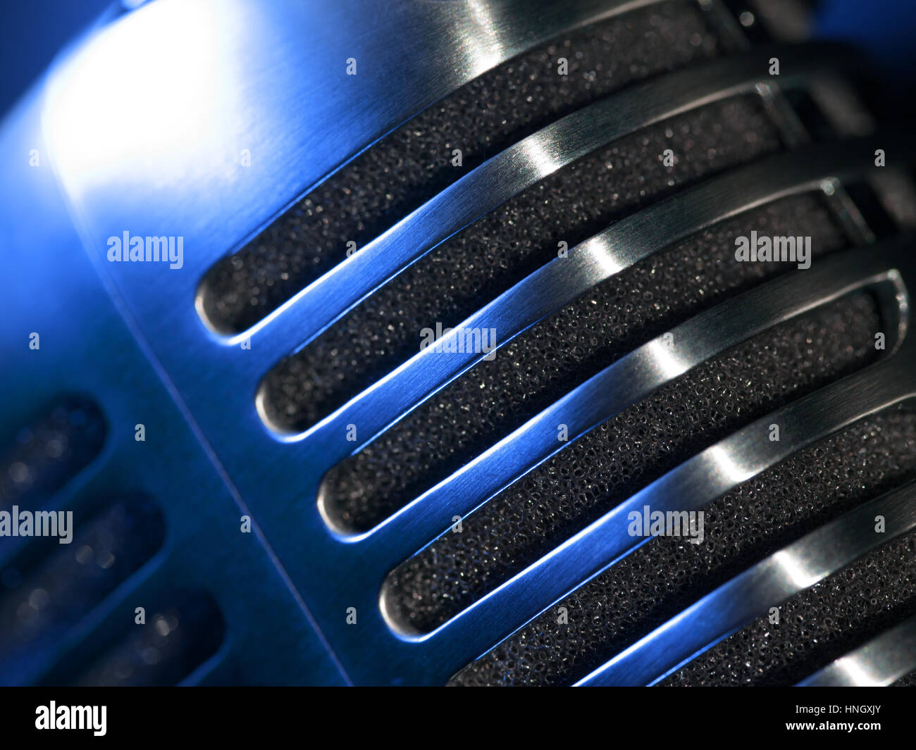 Macro abstract photo of an old-fashioned microphone. Very shallow depth ...
