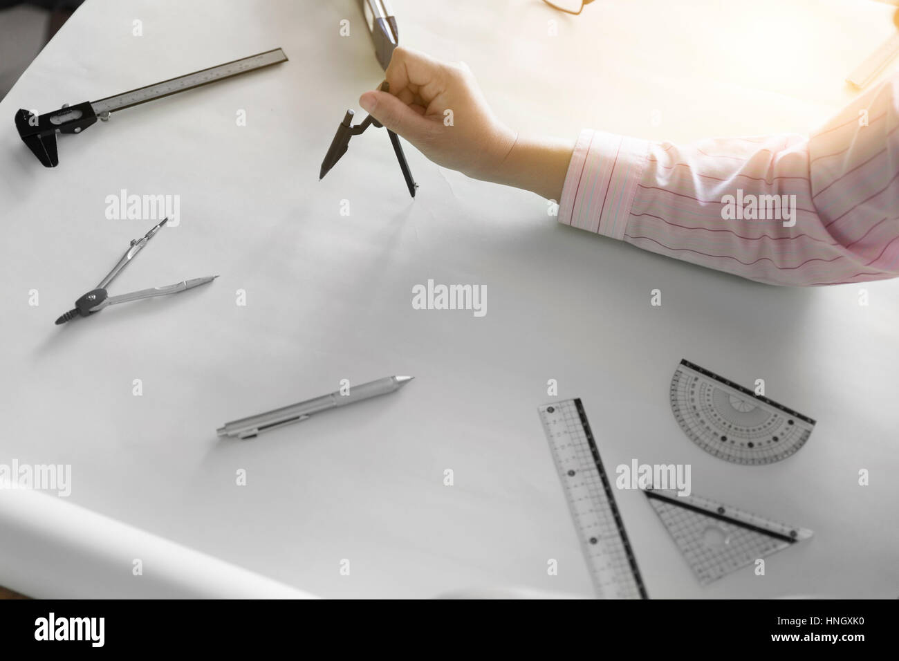 architect hand holding compass working on construction engineering ...