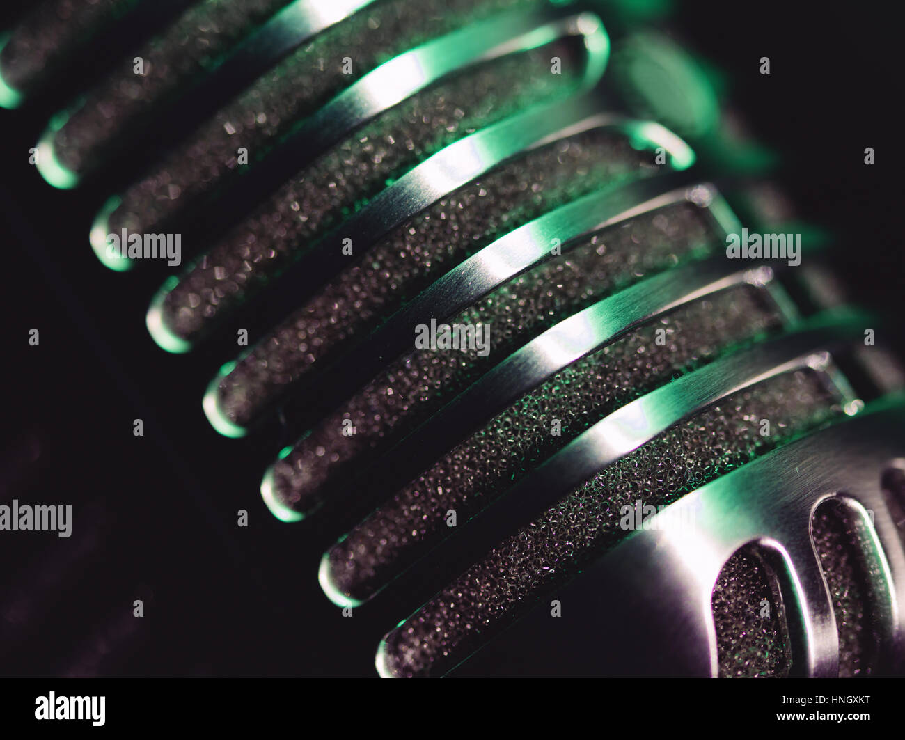 Macro abstract photo of an old-fashioned microphone. Very shallow depth ...