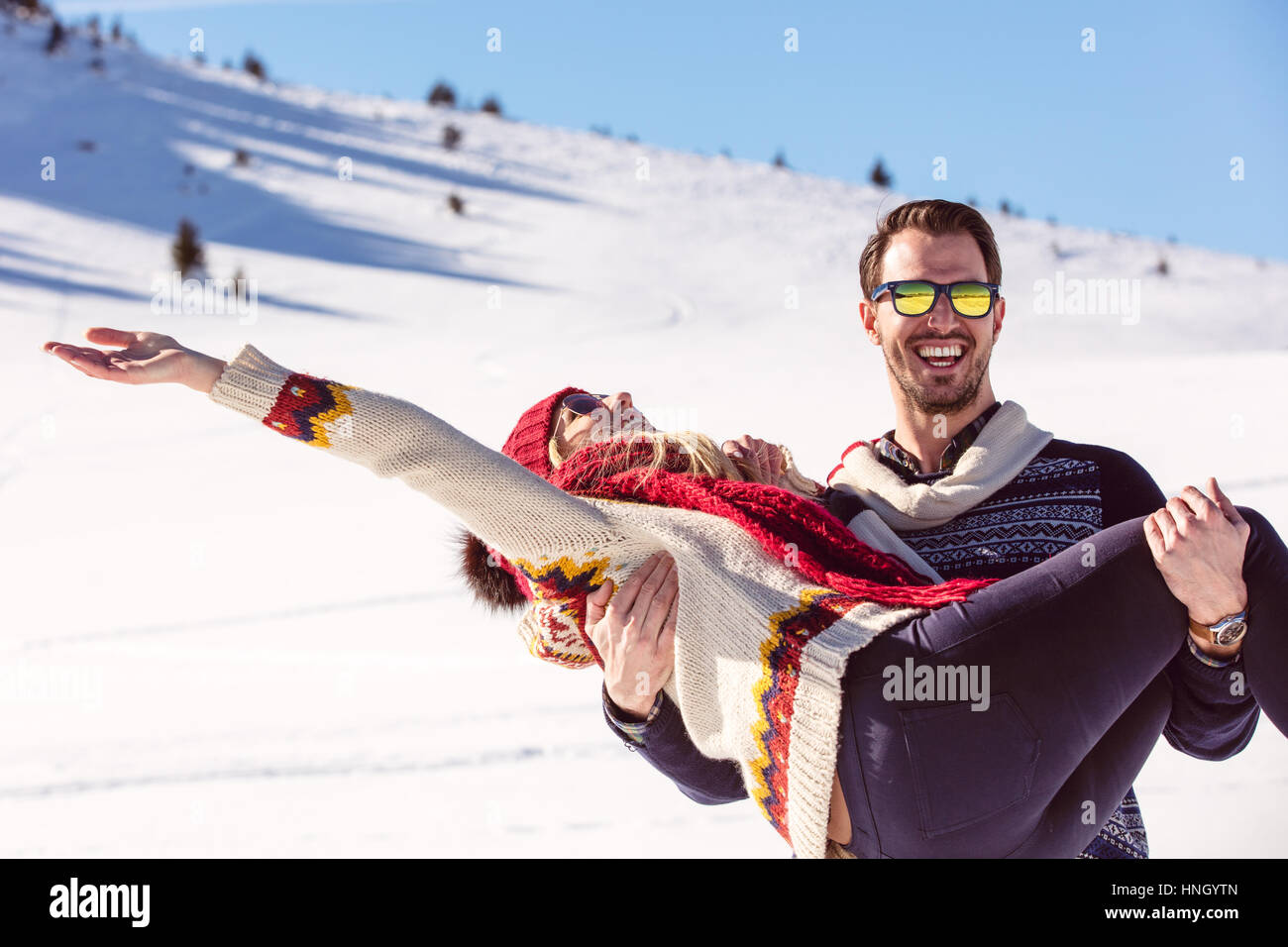 Couple having fun snow hi-res stock photography and images - Alamy
