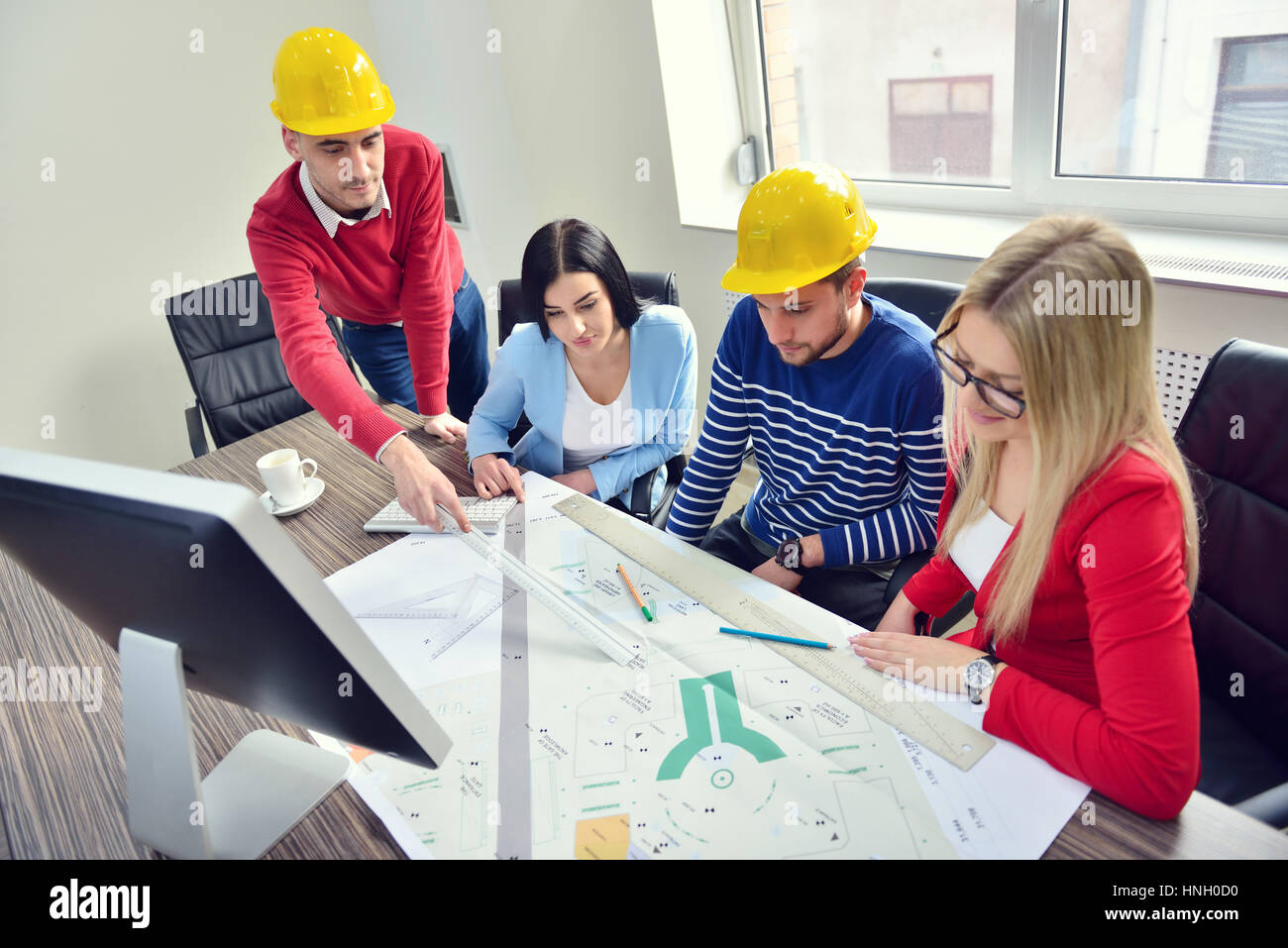 Young team have a Meeting In Architects Office Stock Photo - Alamy