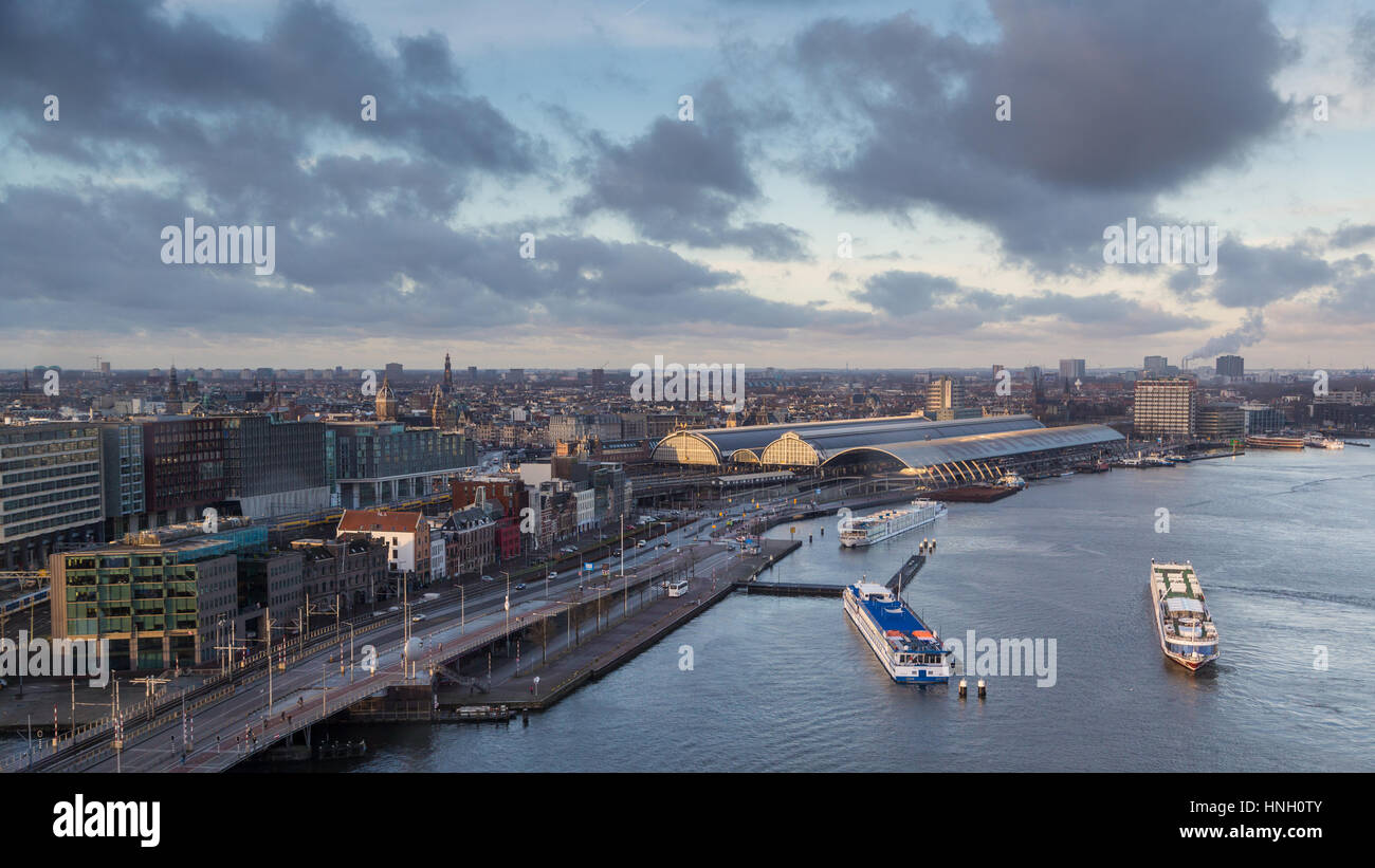 View of Amsterdam with river IJ, Amsterdam Centraal Station, Amsterdam ...