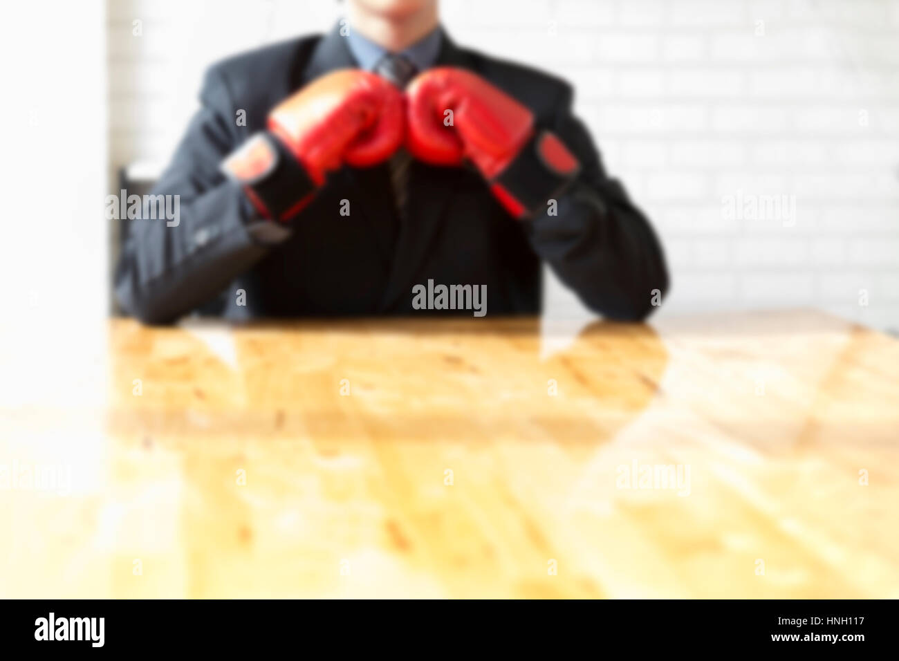 businessman in necktie and suit with red boxing gloves - business ...