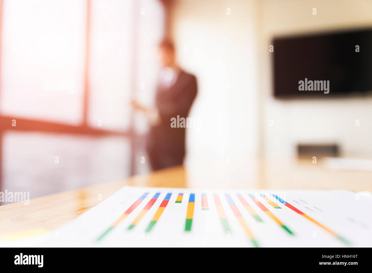 business analysis chart report with background of businessman in suit ...