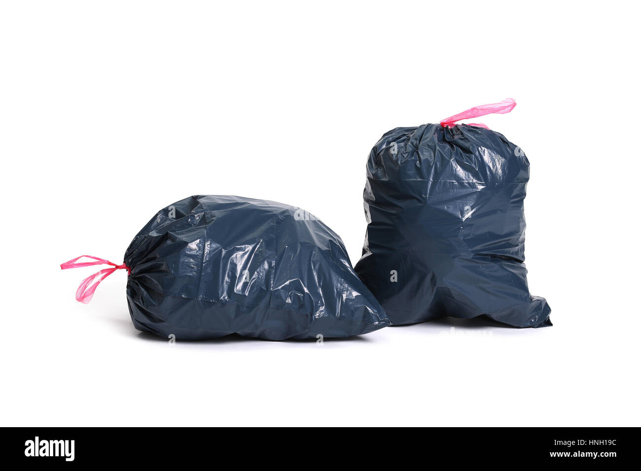 Pollution. Trash bag on a white background Stock Photo - Alamy