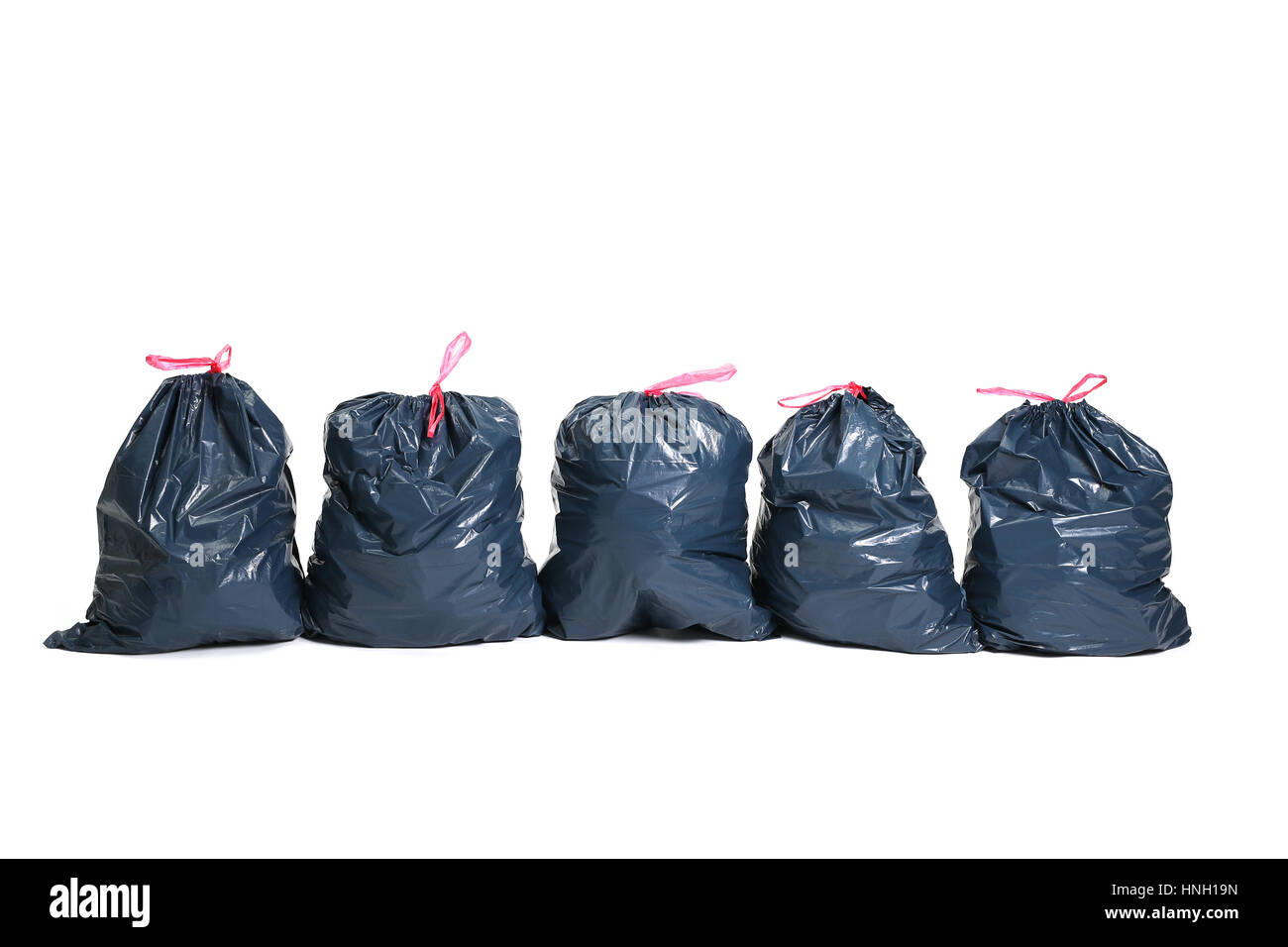Pollution. Trash bags on a white background Stock Photo - Alamy