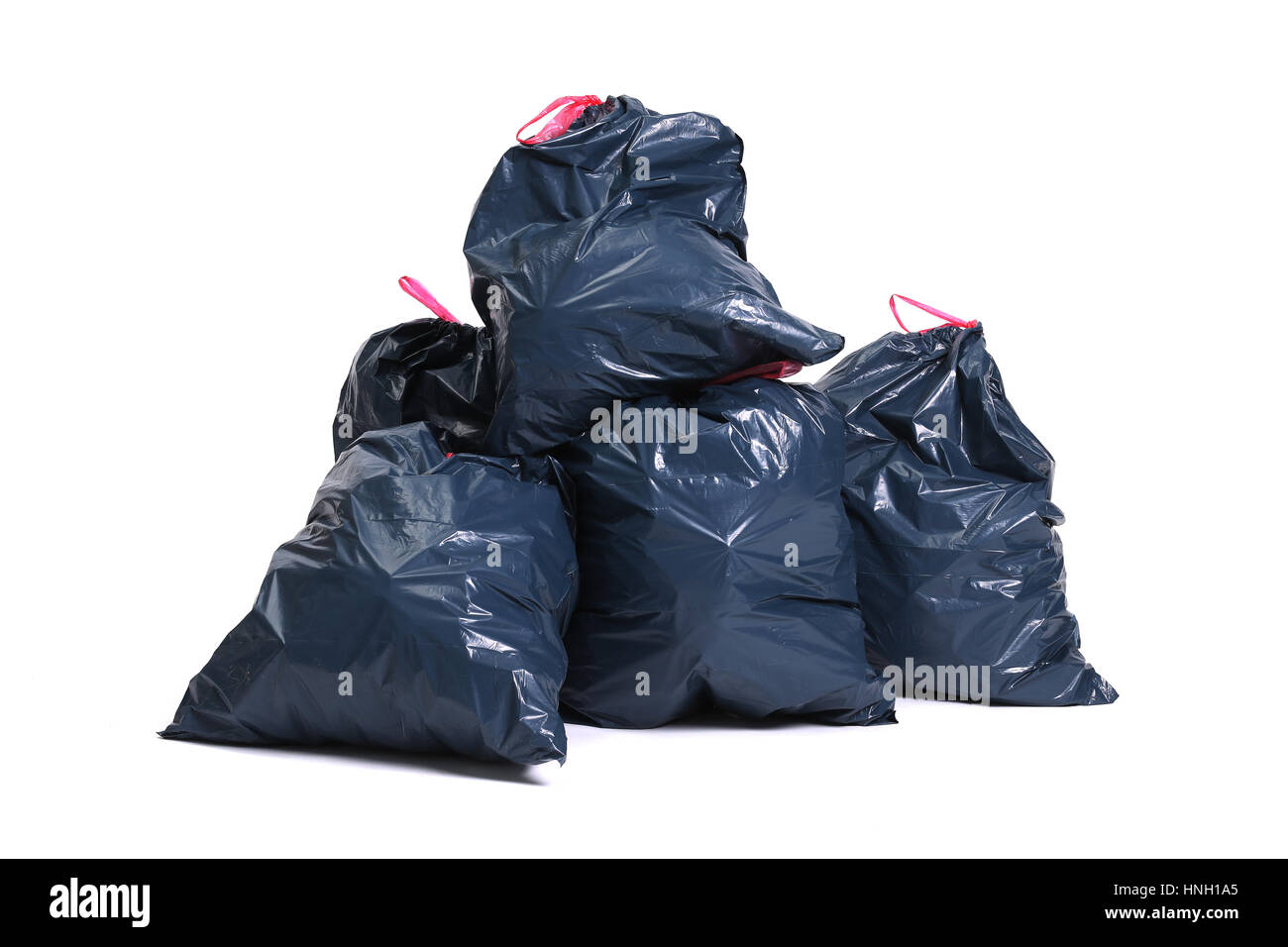 Pollution. Trash bags on a white background Stock Photo - Alamy