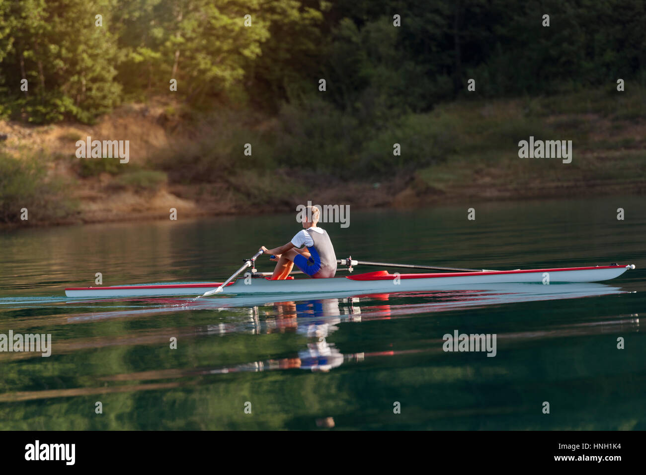 single rower at sunrise Stock Photo - Alamy