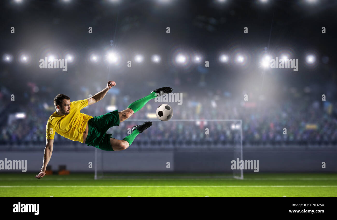 Soccer players in action on stadium fighting for ball. Mixed media ...