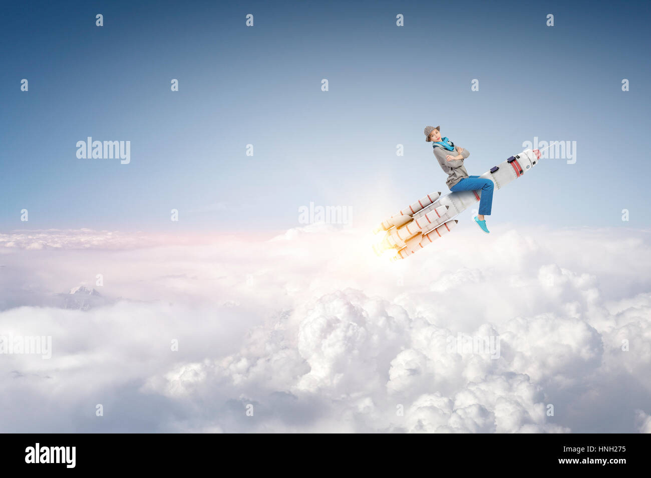 Woman sitting on rocket hi-res stock photography and images - Alamy