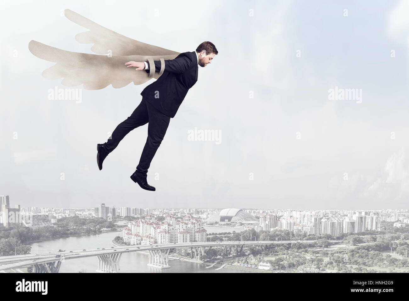 Businessman flying with wings hi-res stock photography and images - Alamy