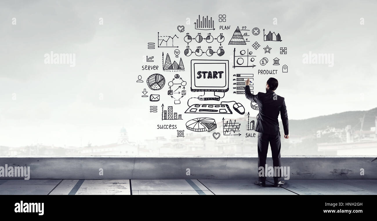 Back view of businessman drawing financial and business concepts Stock ...