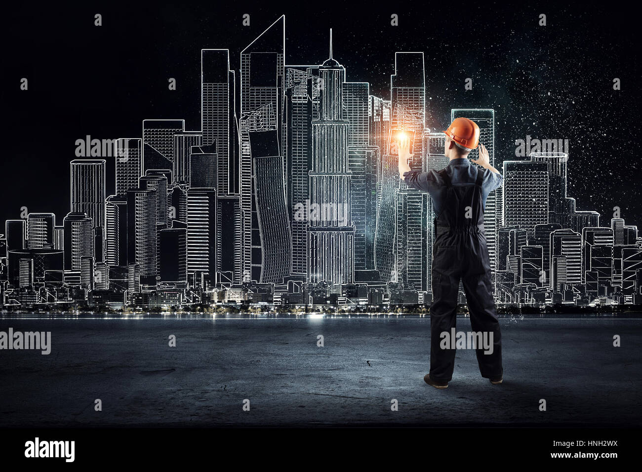 Back view of engineer man working with virtual panel Stock Photo - Alamy