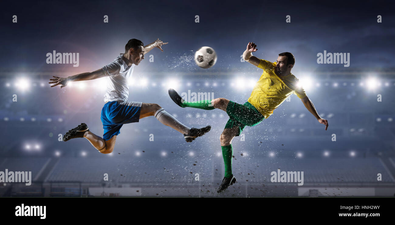 Soccer players in action on stadium fighting for ball. Mixed media ...