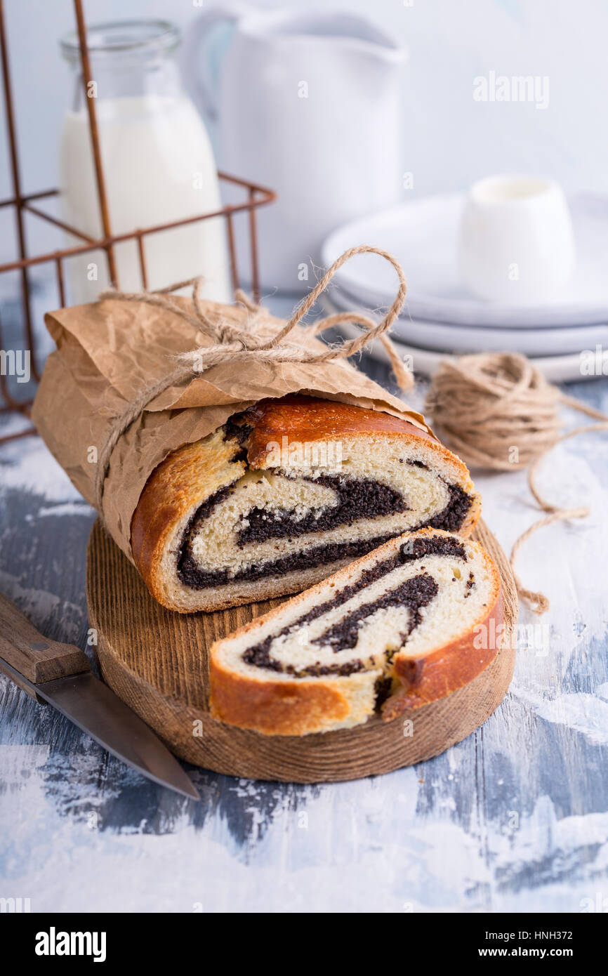 Poppy seed roulade with some milk on background Stock Photo - Alamy