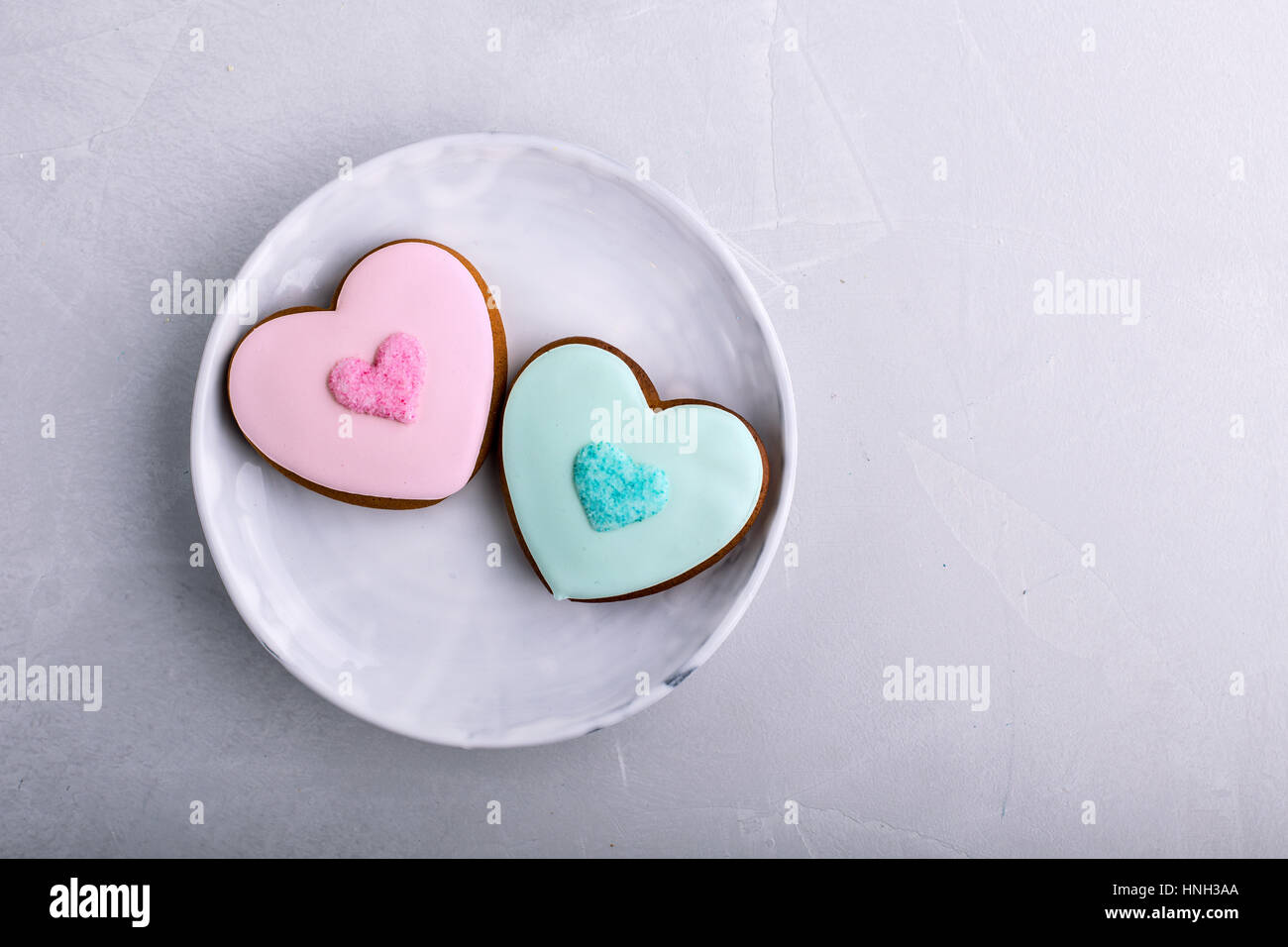Two cookies on saucer hi-res stock photography and images - Alamy