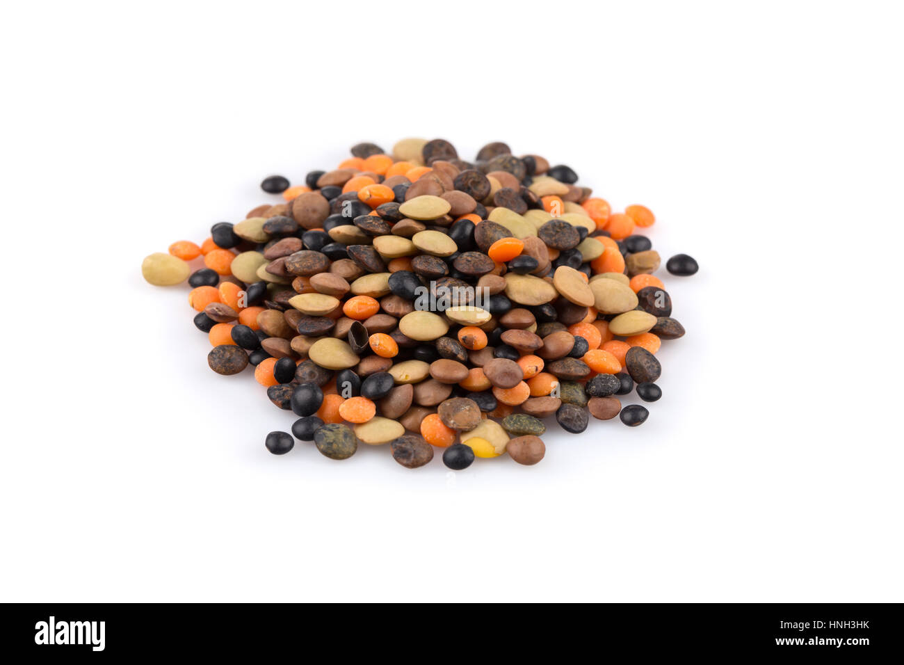 Various lentils mix on a white background Stock Photo - Alamy