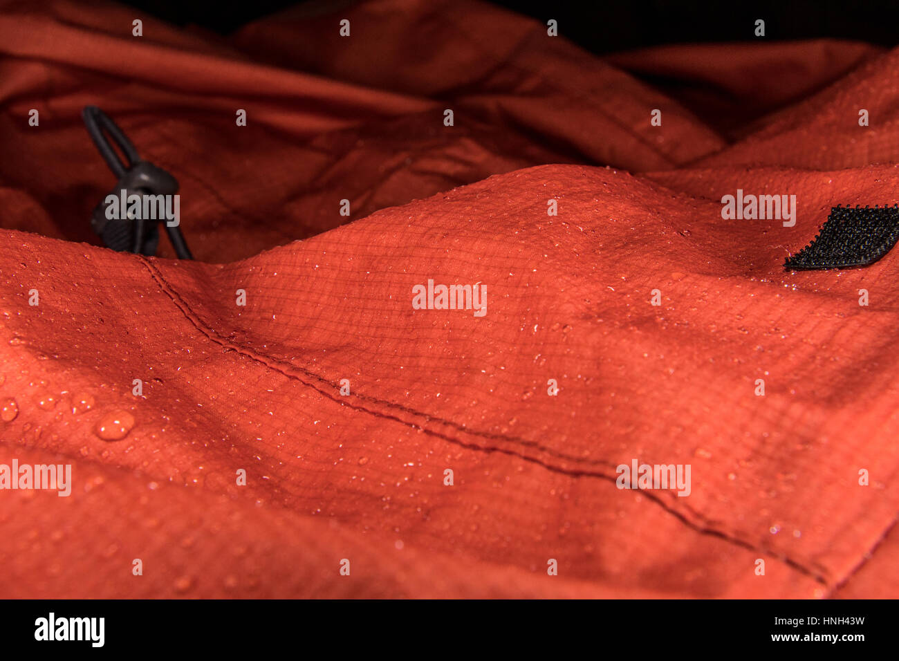 Close Up of Water Drops on Rain Coat with velcro square Stock Photo - Alamy