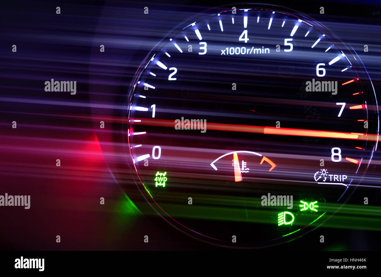 Closeup photo of modern automotive tachometer with hi speed on black ...