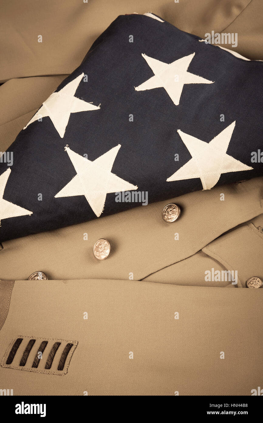 Veteran's Folded Flag on His WW2 Uniform Stock Photo - Alamy