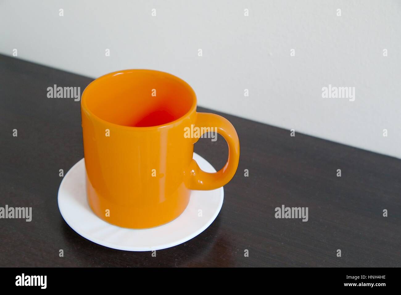 Empty tea mug Stock Photo - Alamy