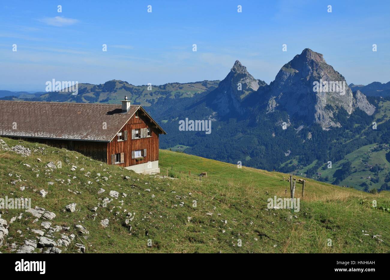 Summer scene in Switzerland. View from Stoos, mount Mythen. Farmhouse ...