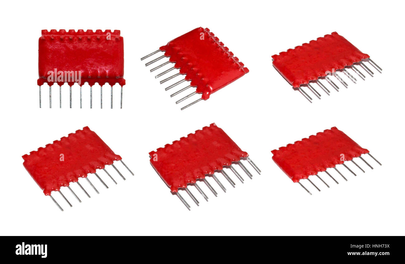 Old red microchip on a white background isolated Stock Photo - Alamy