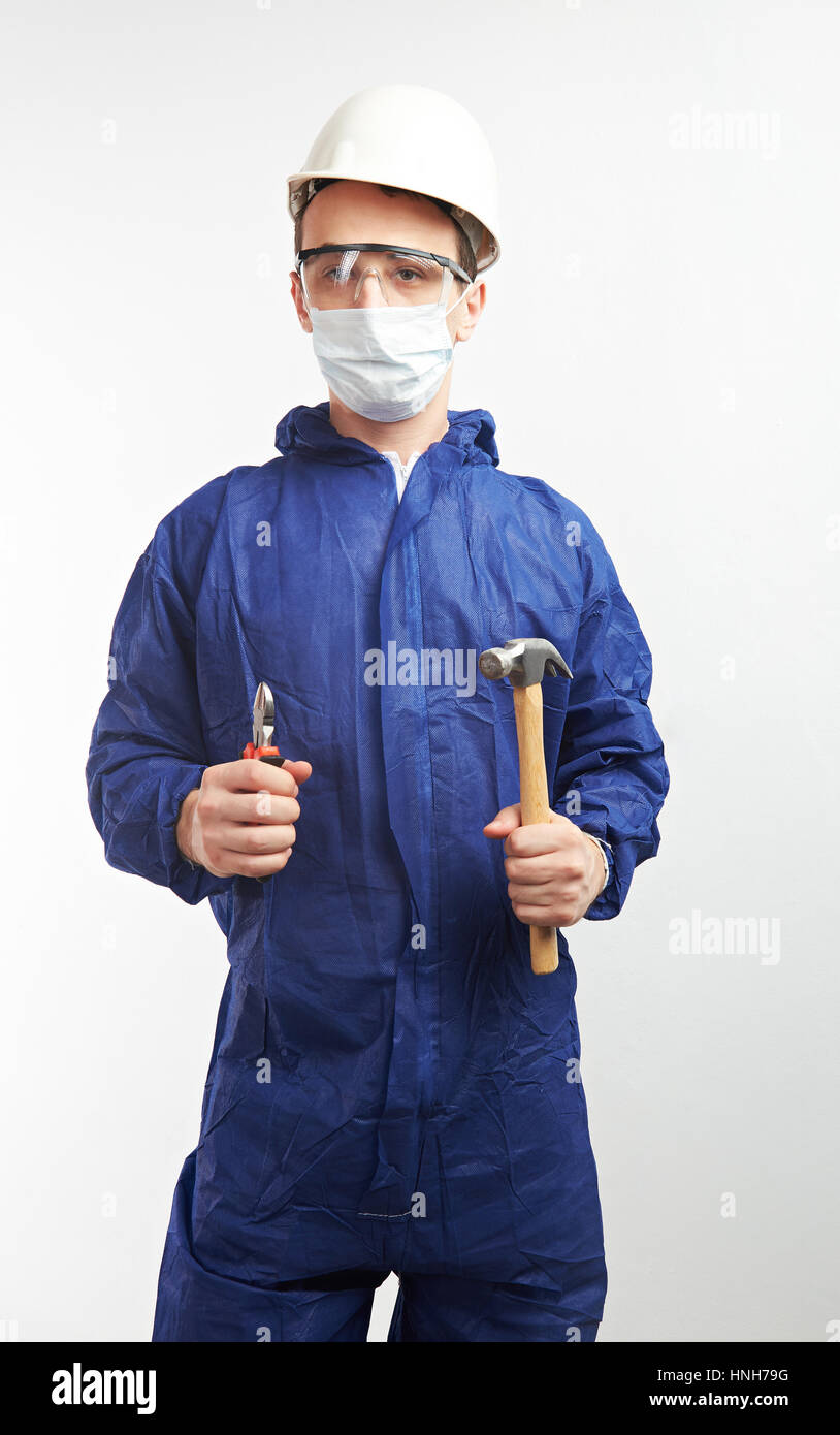 man worker with pliers and hummer in blue uniform isolated on white ...