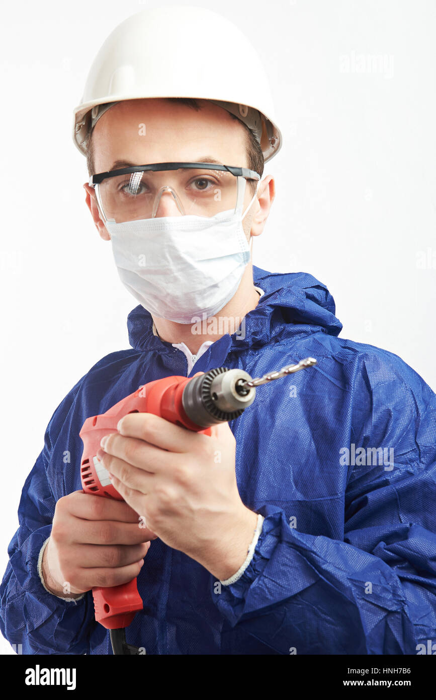 Portrait of worker with drill in hardhat isolated on white background ...