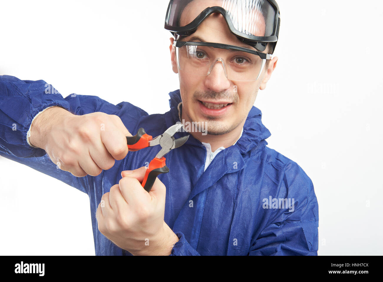 worker man in uniform with pliers isolated on white background Stock ...