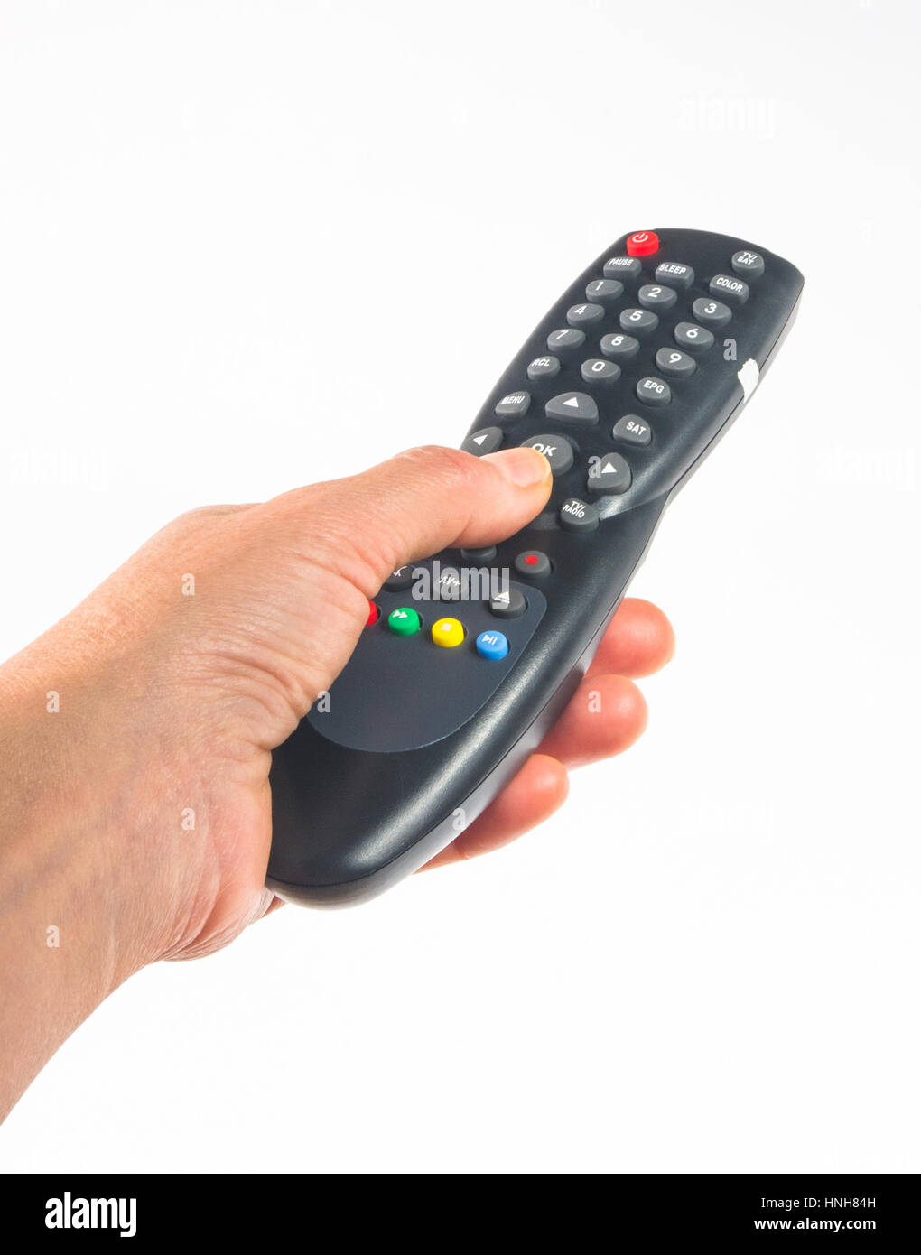 hand holding a remote control on white background Stock Photo - Alamy