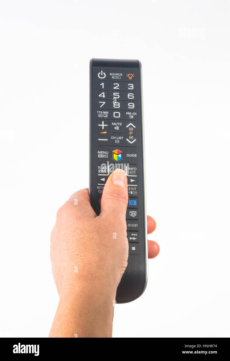 hand holding a remote control on white background Stock Photo - Alamy